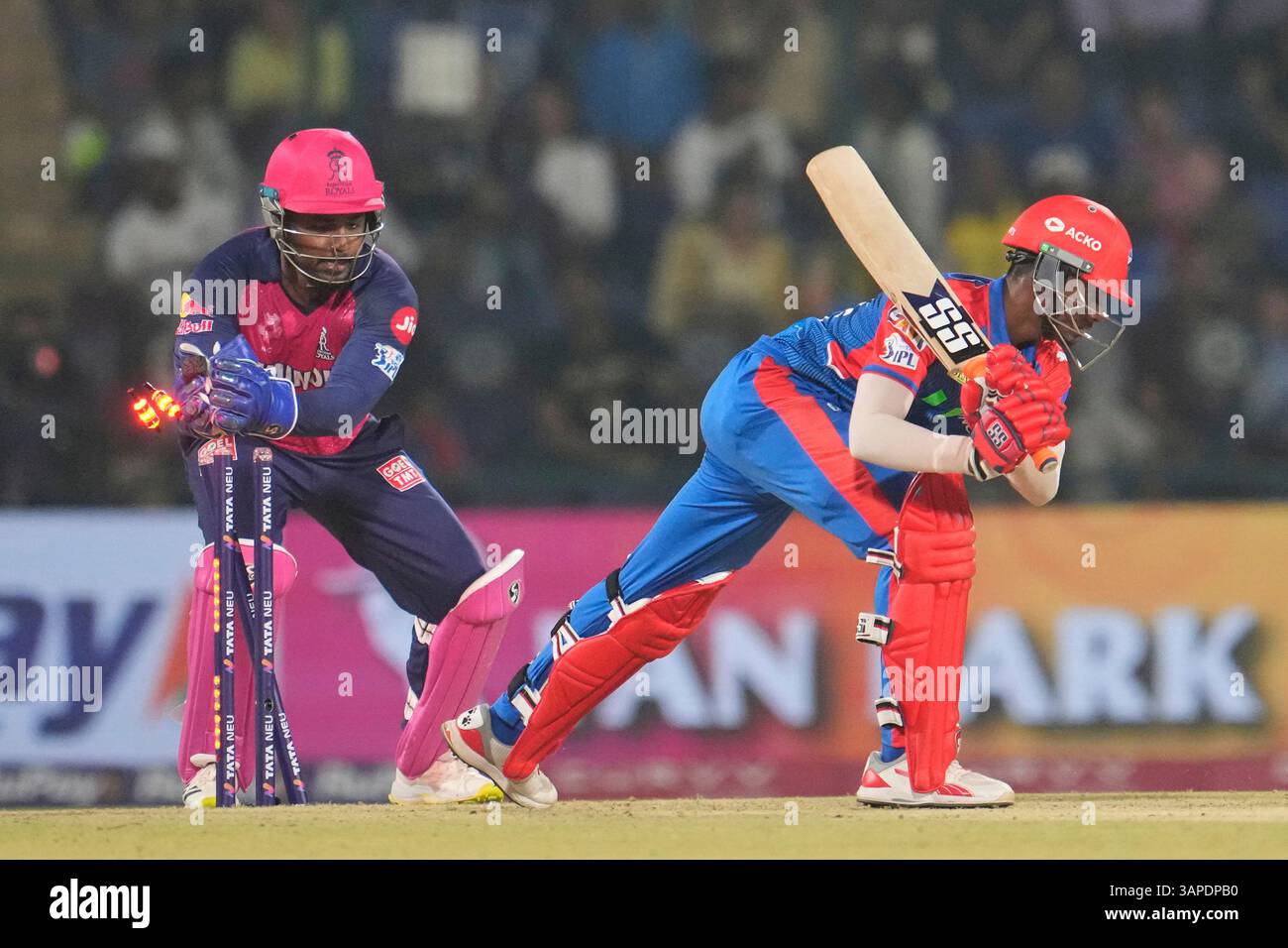Rajasthan Royals' Sanju Samson, left, unsuccessfully attempts to stump ...