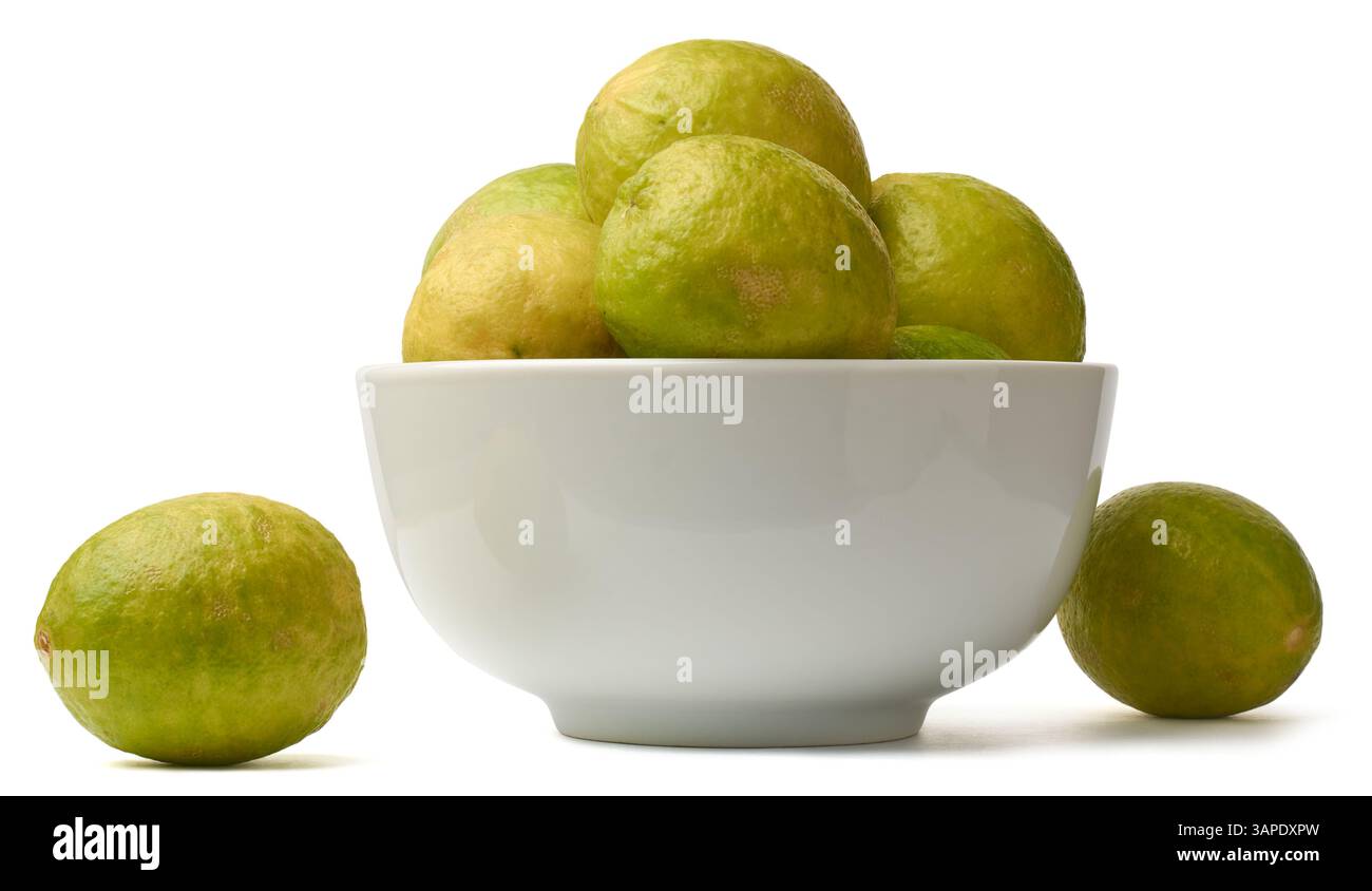 yellow skinned lemon on bowl and scattered isolated white background ...