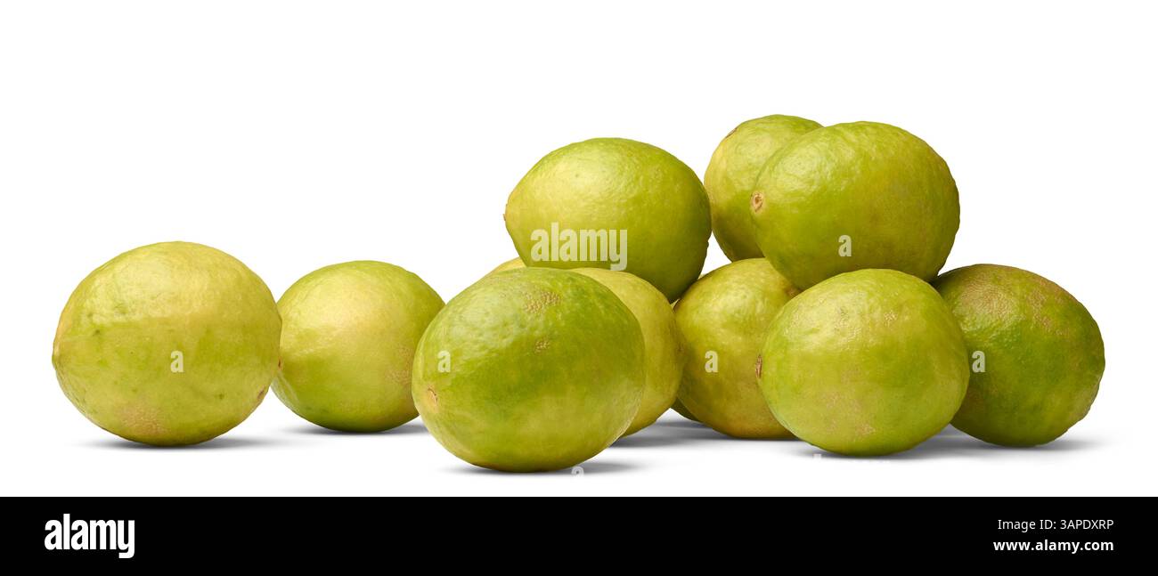 pile of yellow skinned lemon isolated white background, fresh bright ...