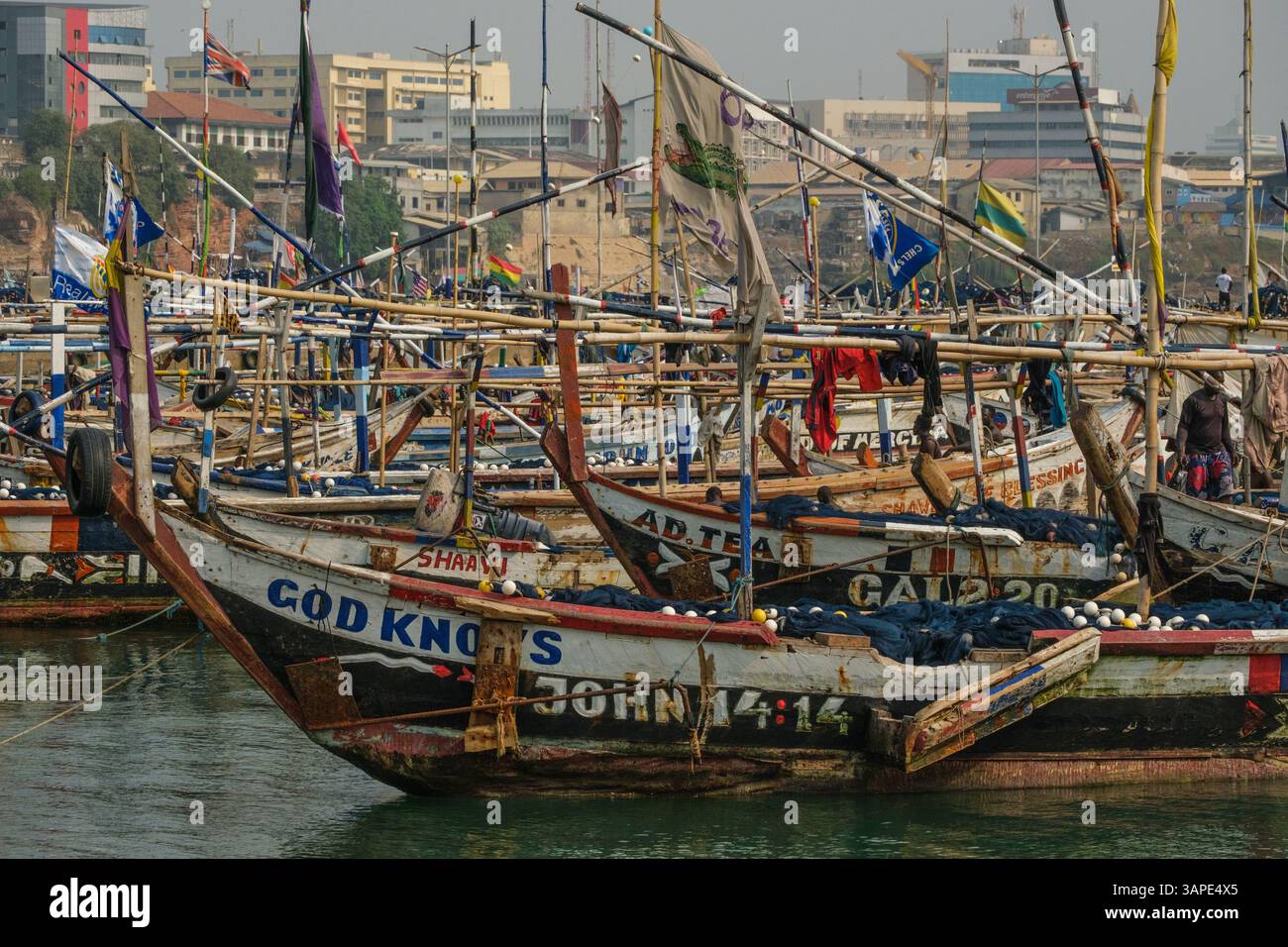 Accra, Ghana. Fishing Boats in Jamestown Fishing Harbor with Religious ...