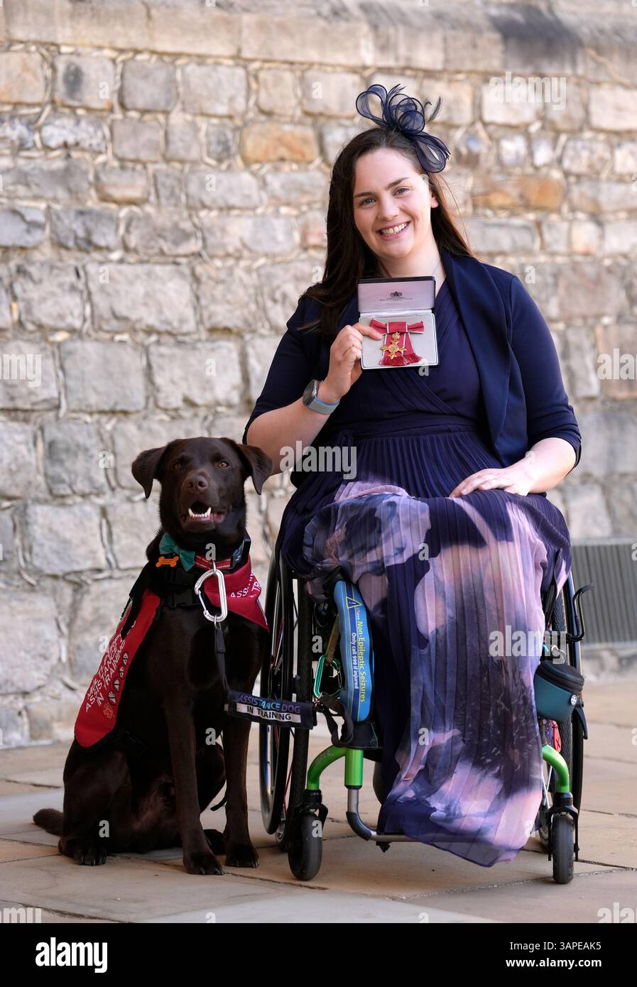 Tully Kearney with her dog Huxley after being made an Officer of the ...