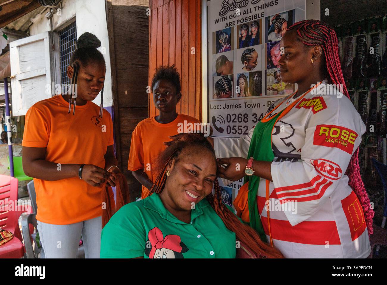 Accra, Ghana, Usshertown District. Woman Having Hair Extensions ...