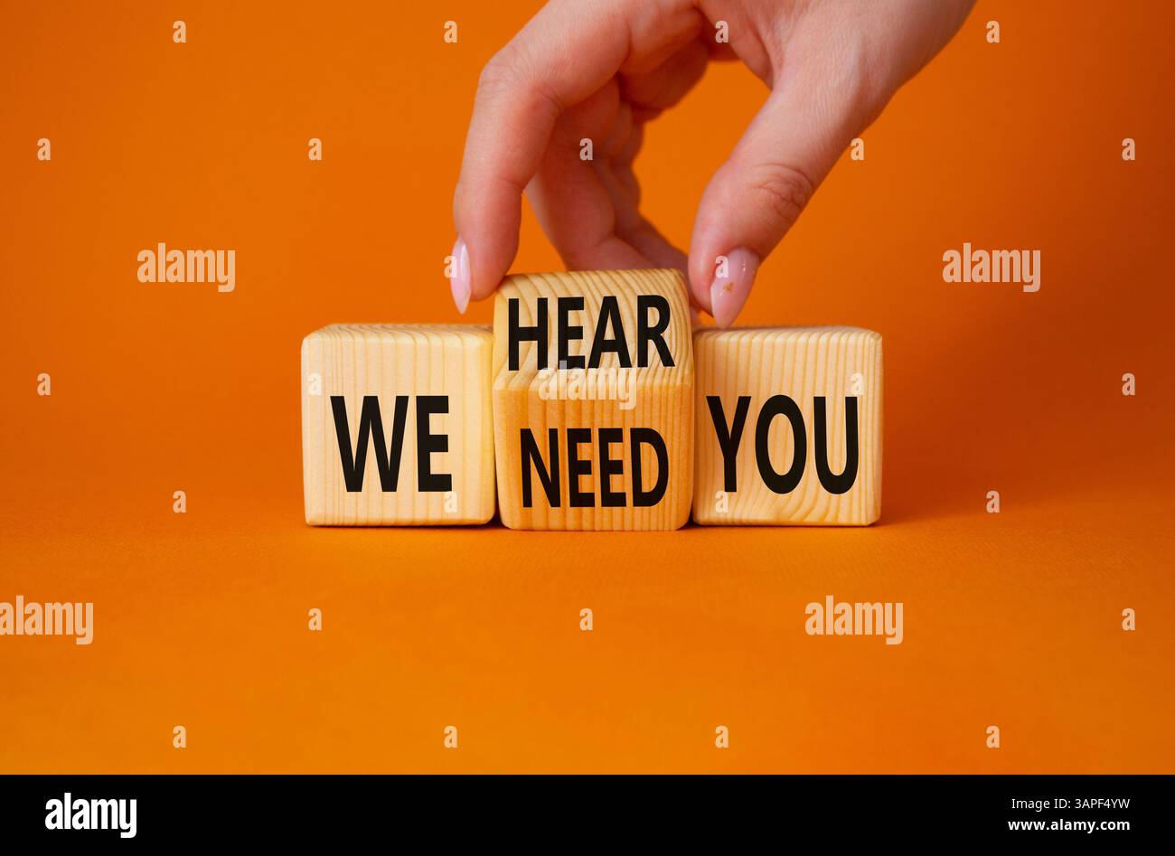 We hear and need You symbol. Businessman Hand turns cubes and changes ...