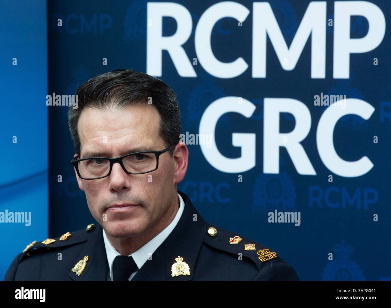 RCMP Superintendent Stefan Thoms looks on during a news conference ...