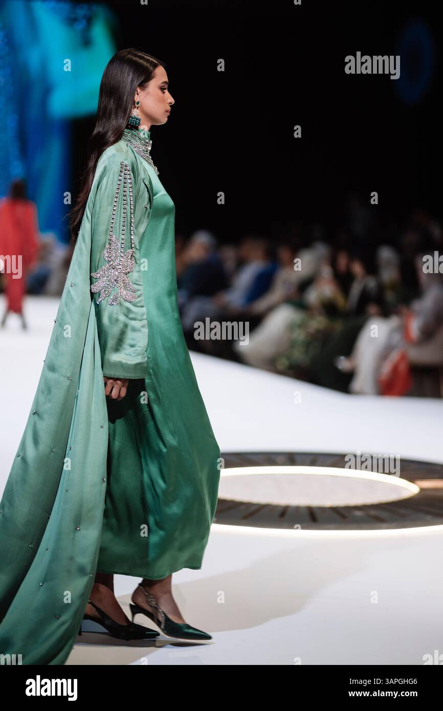 Abu Dhabi, United Arab Emirates. 15th Apr, 2025. A model seen walking ...