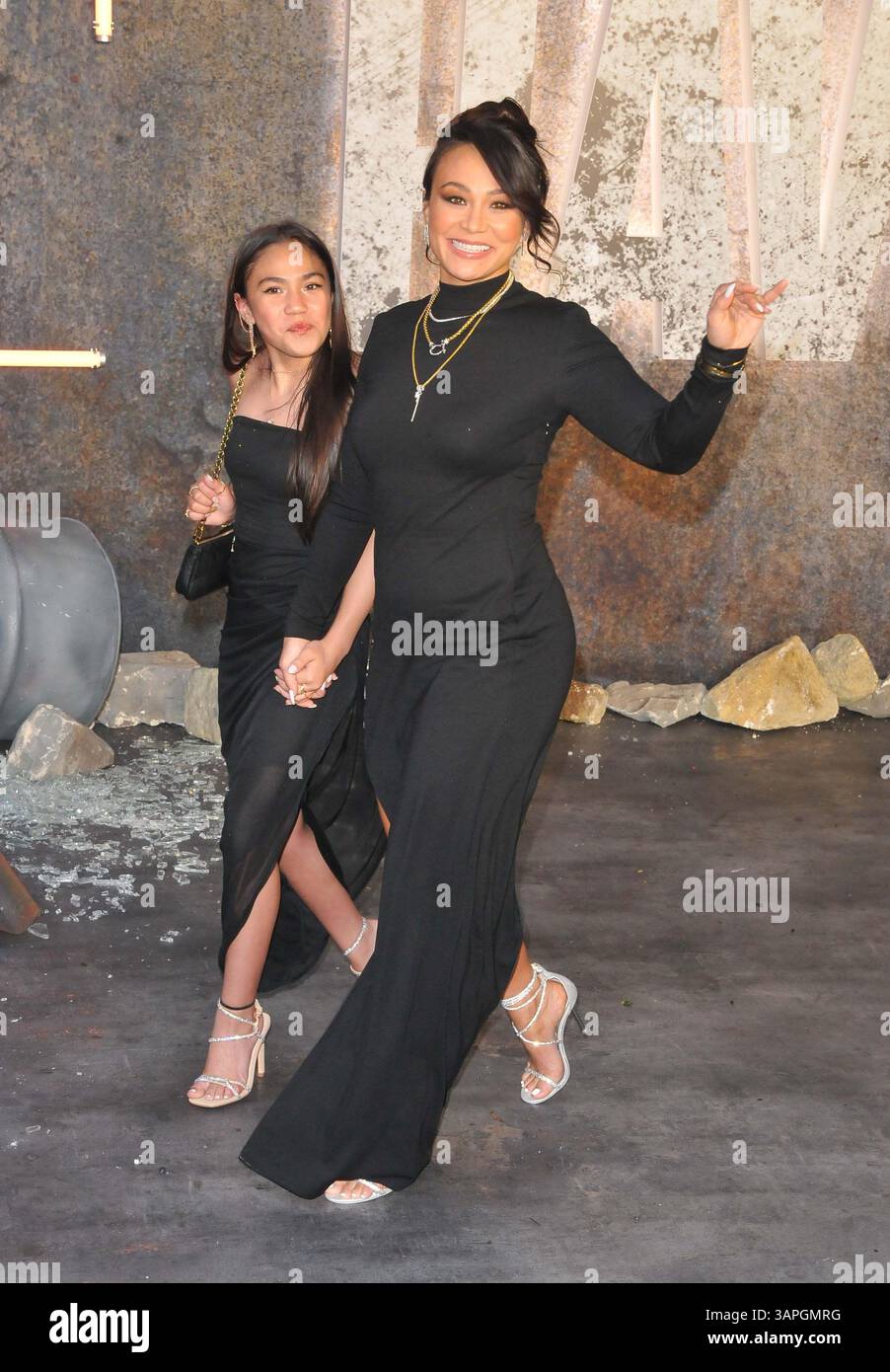 London, UK. 15th Apr, 2025. Michelle Waterson-Gomez (right) and guest ...