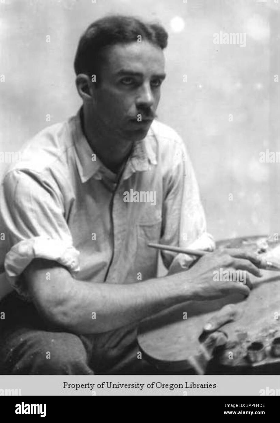 Frank Long, a painter and muralist at Berea College, is photographed ...