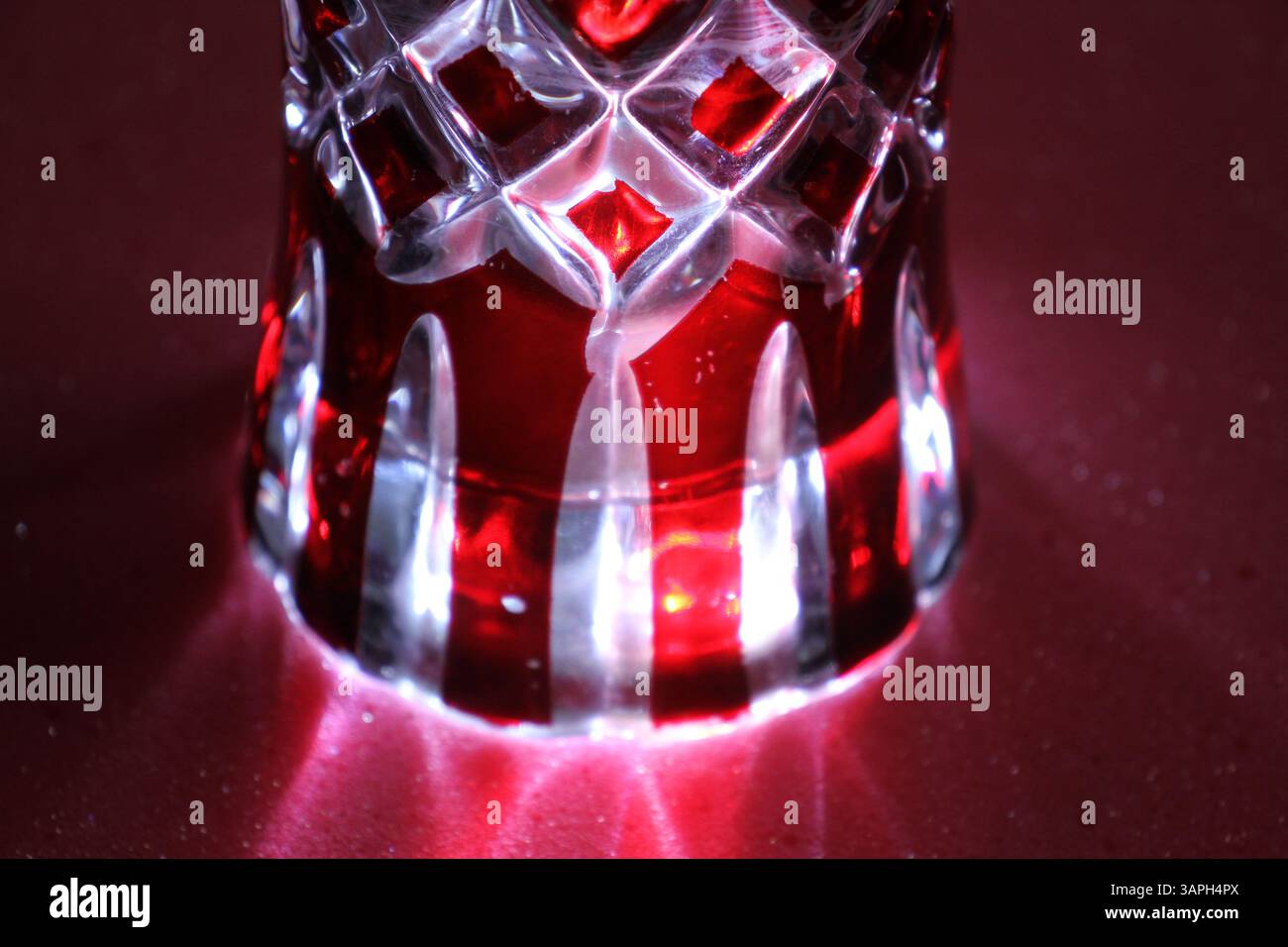 A shining glass made showpiece on a surface with sharp light Stock ...