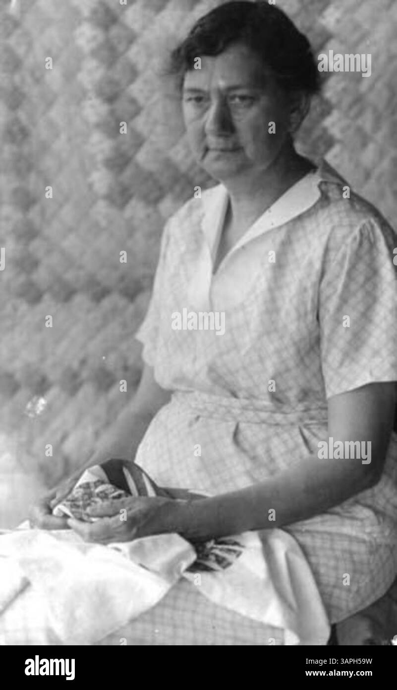 This photograph depicts Sarah Alice Hatcher, a skilled quilter. Her ...
