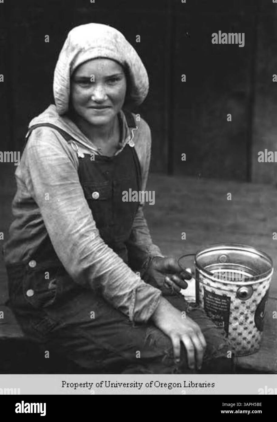 This photograph captures Rachel Stewart, a singer, with a tin lunchpail ...