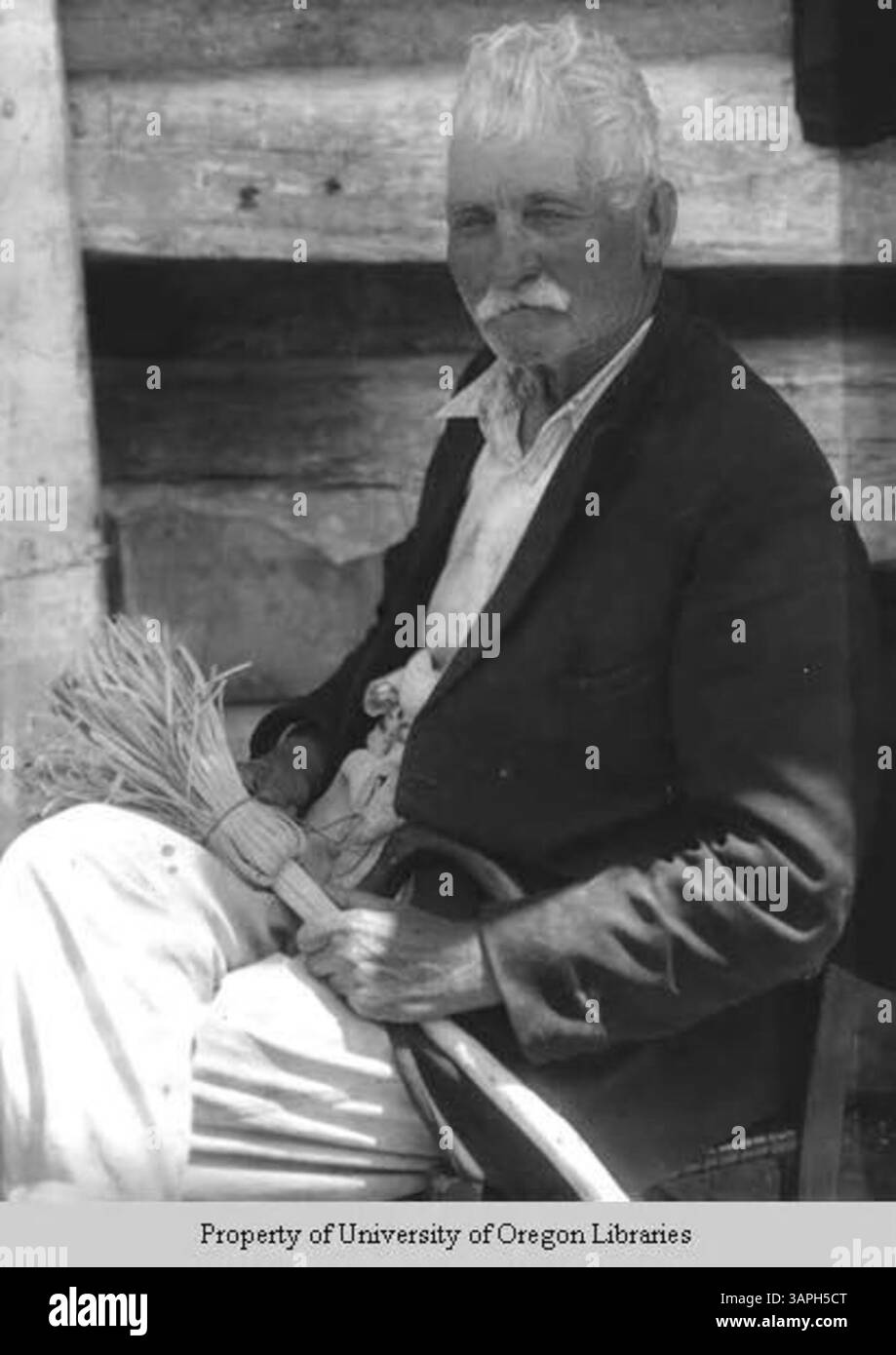 A photograph of Isaac Davis, a broom maker, captured in the Doris ...