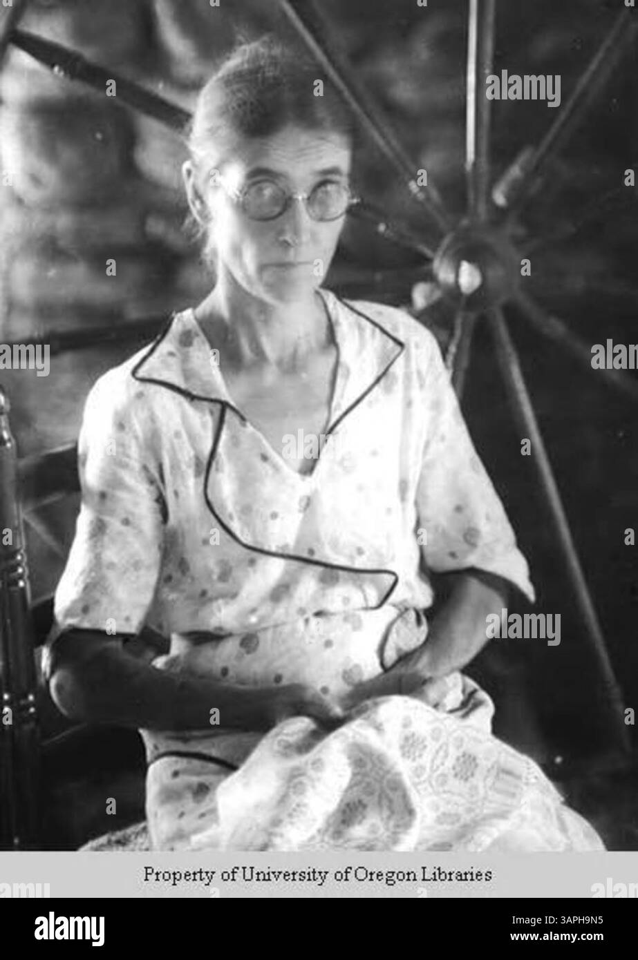 Molly Moore is pictured spinning, with a spinning wheel in the ...