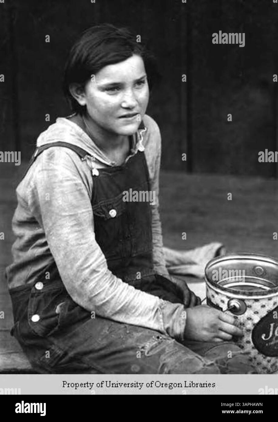Rachel Stewart, a young woman and singer, is captured holding a tin ...