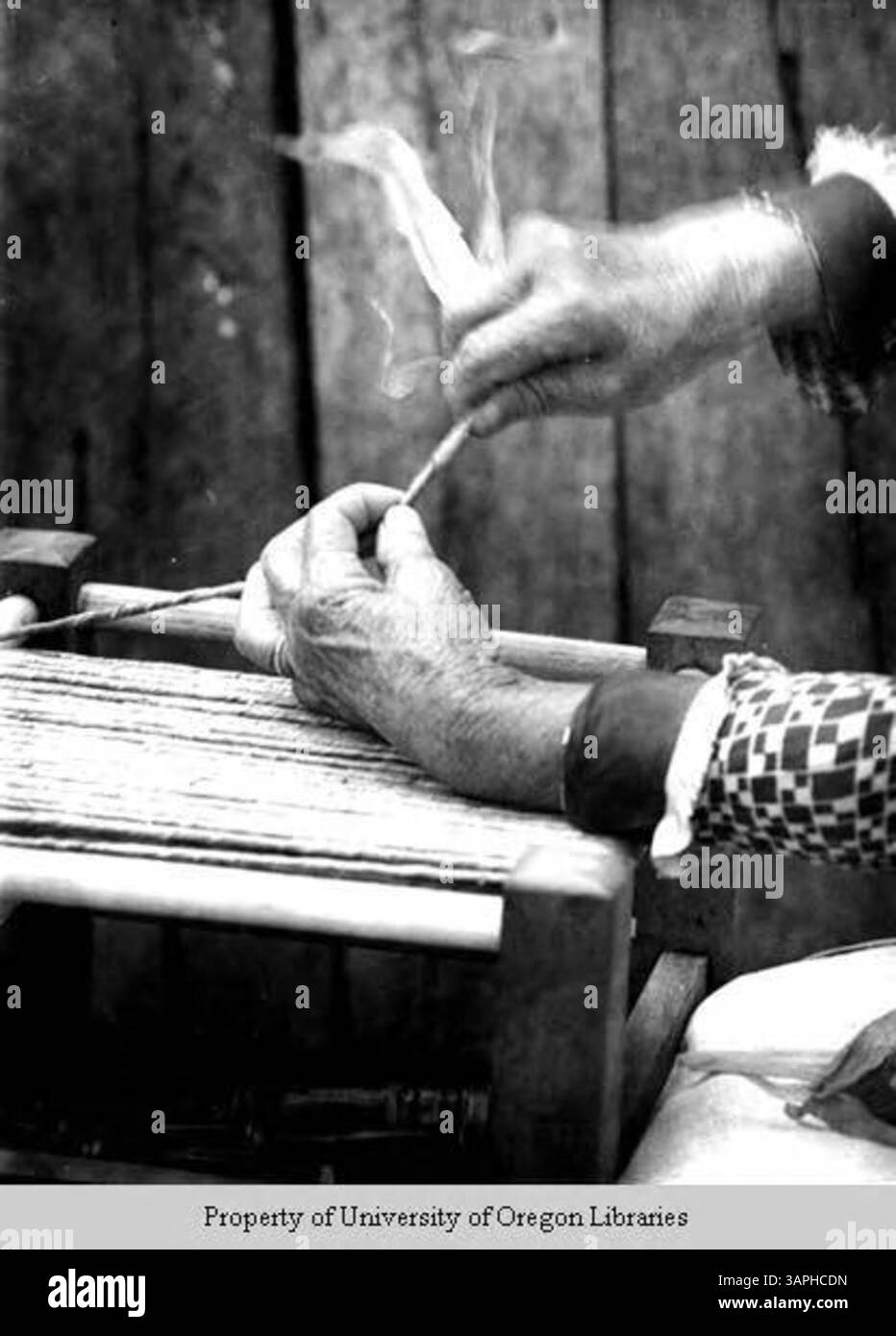Mrs. Lucy Lakes from Berea is captured caning a chair, a skillful craft ...