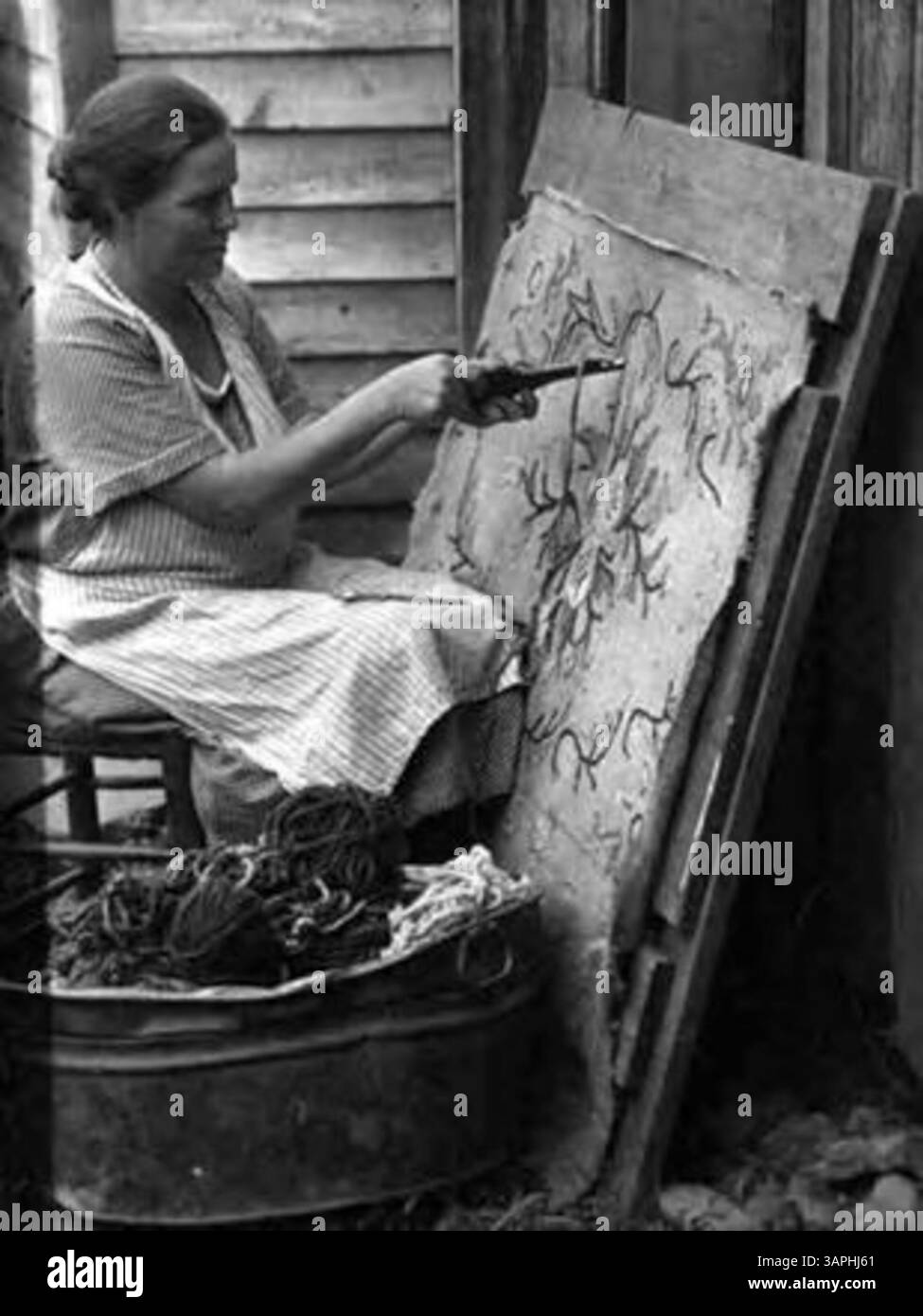 Photograph of Mrs. Sarah Owen Anderson making a hooked rug, from Jack's ...