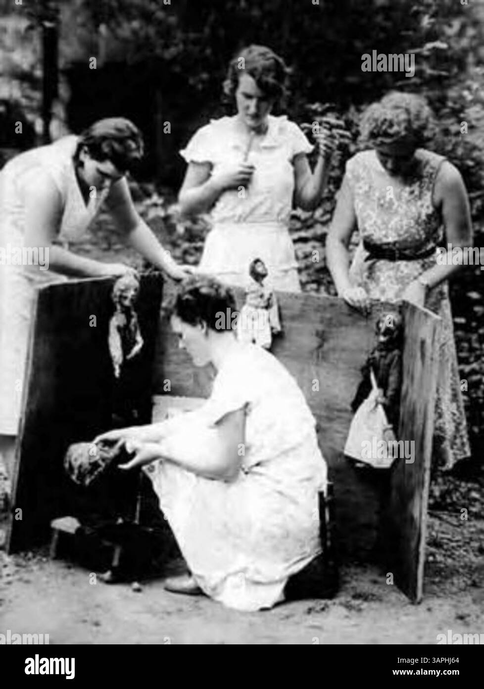 Photograph of the Ritchie girls with marionettes, part of the Doris ...