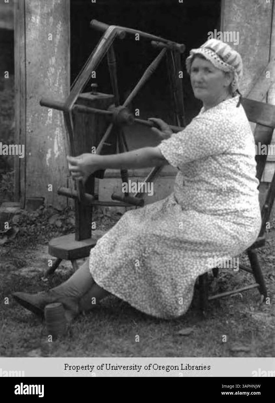 Photograph of S.U. Wyatt, a weaver, dyer, and spinner, winding wool ...