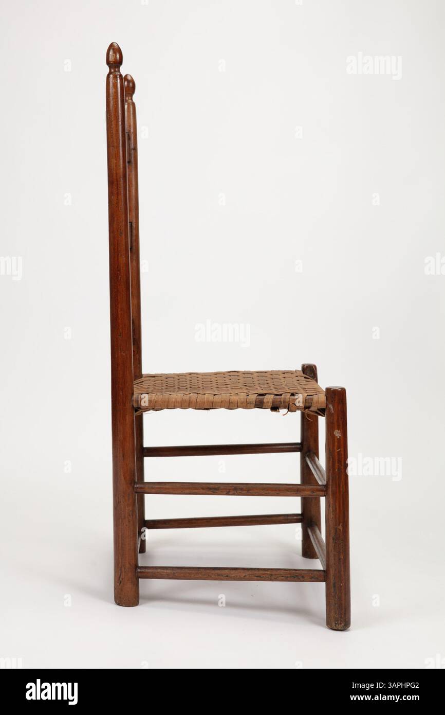 This slat-back side chair, made with wood and featuring a woven hickory ...