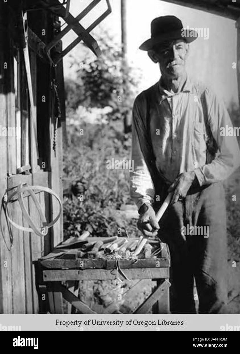 This photograph captures Mac McCarter creating baskets. It is part of ...
