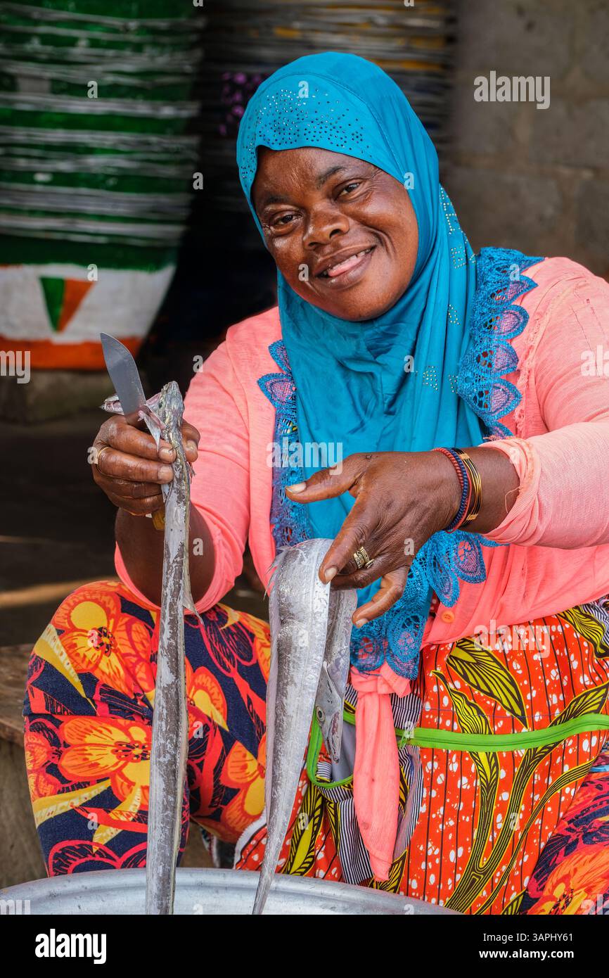 Ghana, Elmina. Market Vendor Displaying her Fish for Sale Stock Photo ...