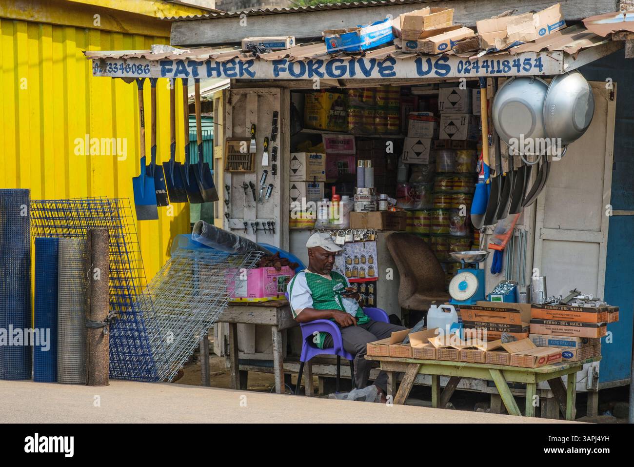 Ghana, Cape Coast. Small Hardware Shop with Religious Name Stock Photo ...