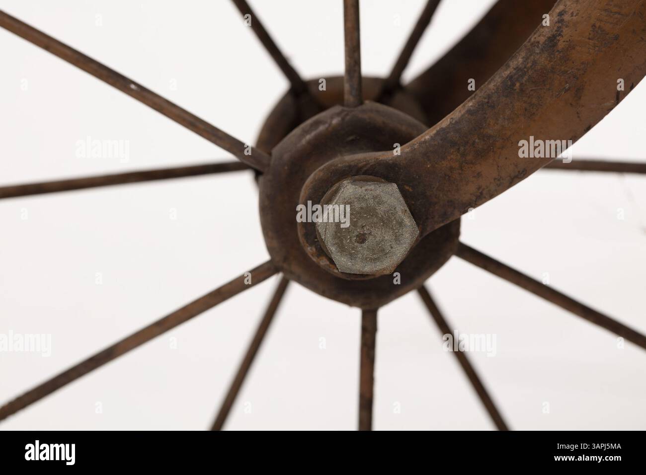 This three-wheeled child's wheelchair, featuring a caned seat and back ...
