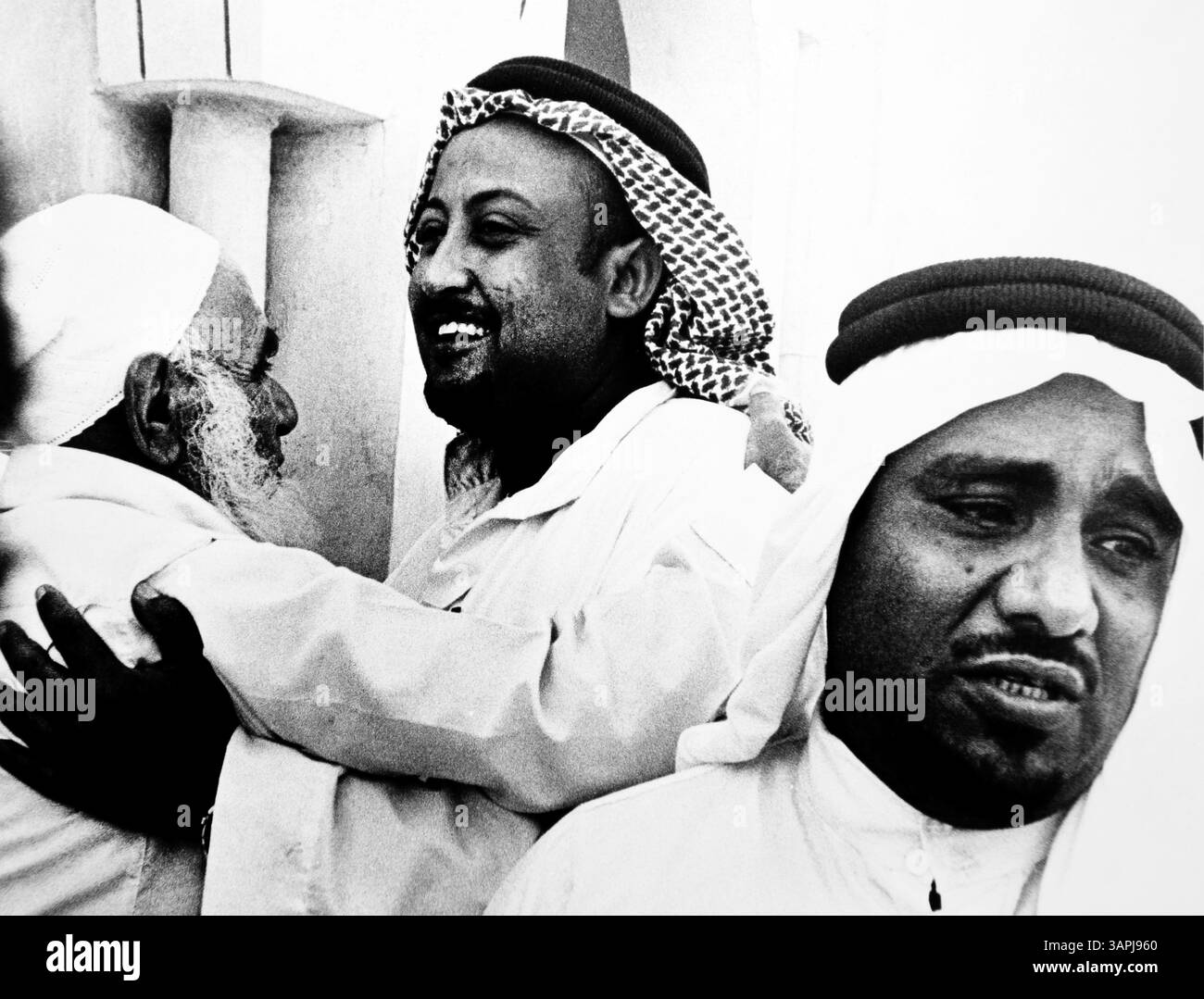 Saudi Arabian men wearing Traditional Clothing embracing Greeting one ...