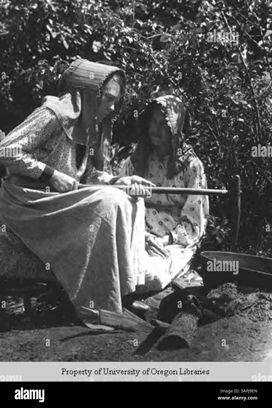 This photograph captures Anner and Ainer Owenby, two women in bonnets ...