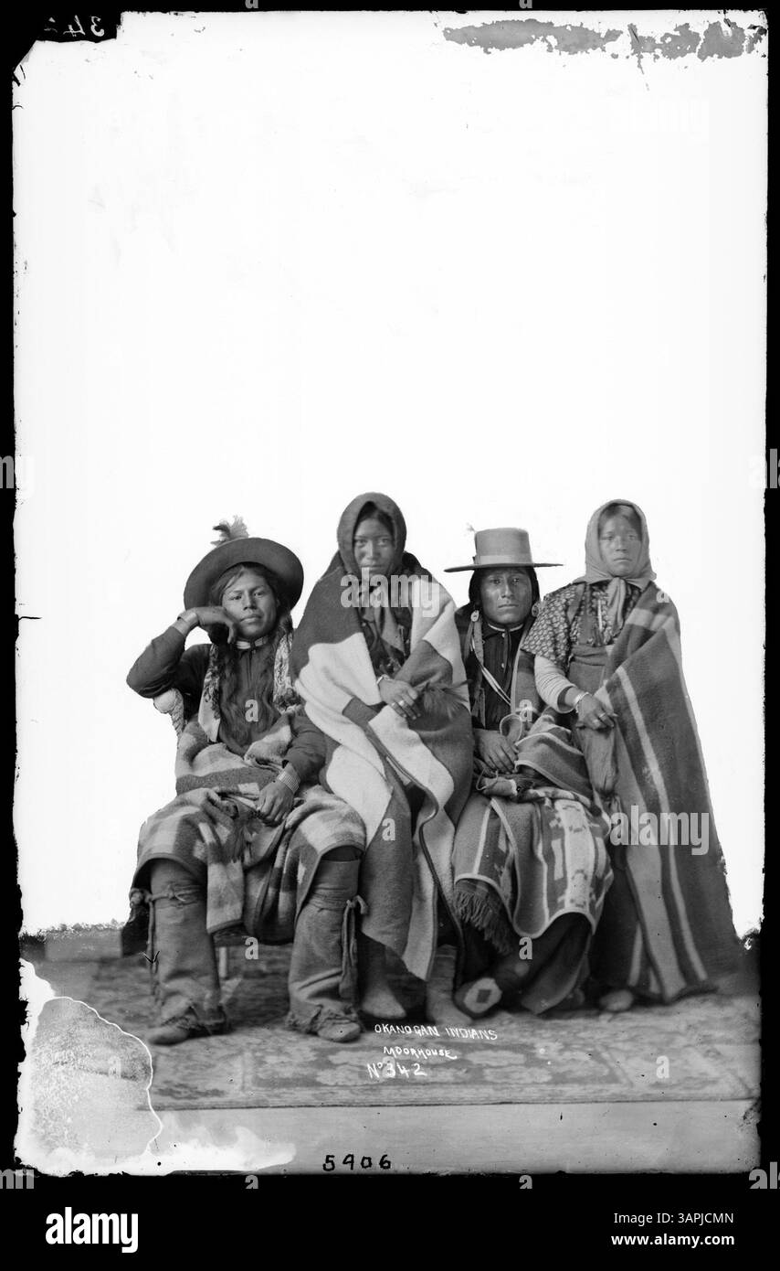 The photograph, titled 'Okanagon Indians in Regalia,' is part of the ...