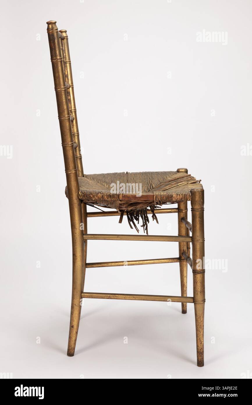 This wooden Chiavari style side chair is painted in gold, with a rush ...