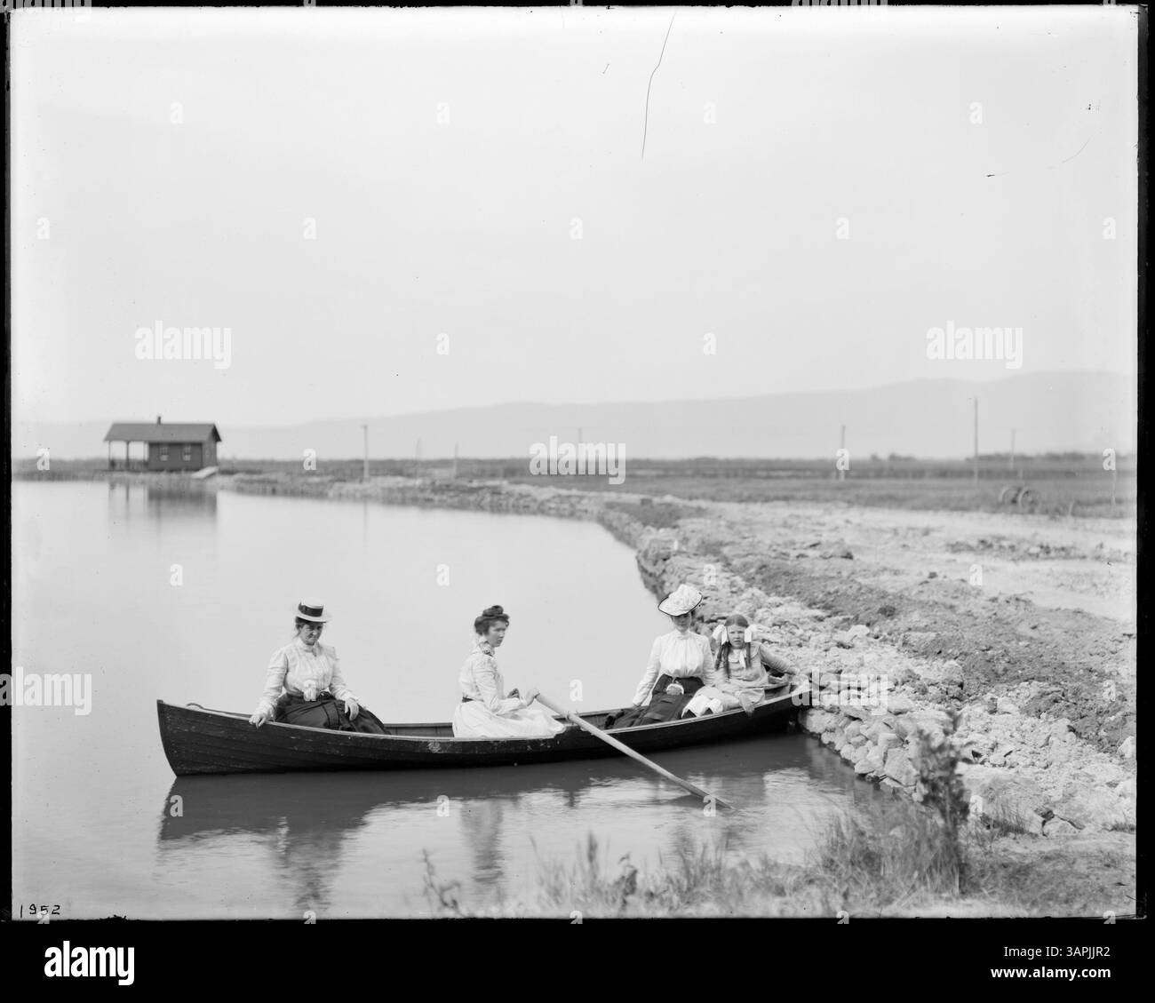 This photograph shows people boating on Hot Lake, offering a glimpse ...