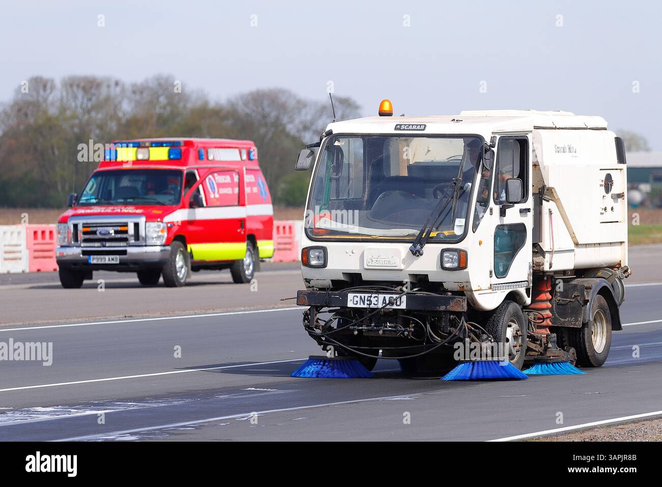 Race track road sweeper cleaning up the drag strip at Melbourne Raceway in Yorkshire after an ...