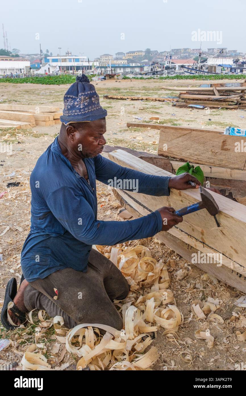 Ghana, Elmina. Foreman of a Carpenter Crew Building a New Fishing Boat ...