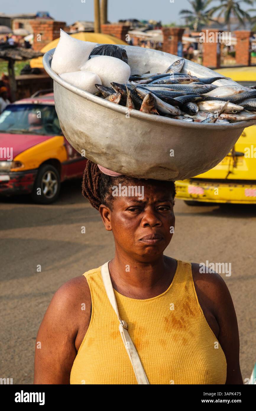Ghana, Elmina. Woman Balancing a Basin of Fish on her Head at the Fish ...