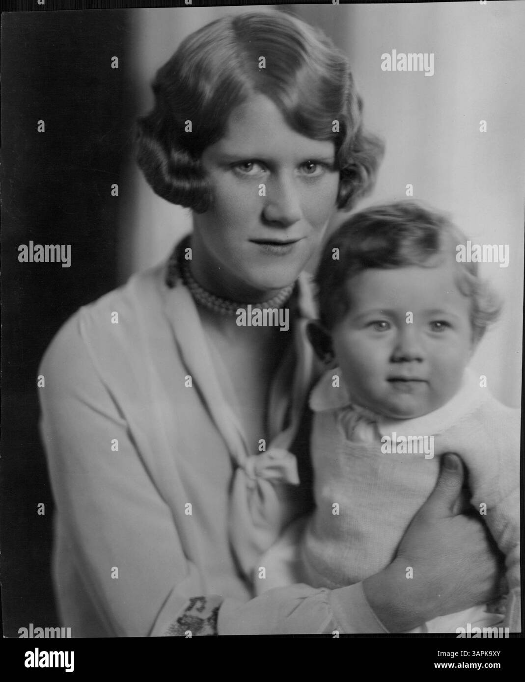 Mrs. Thomas King Baker and her son, Thomas King Baker III, of Tenafly ...