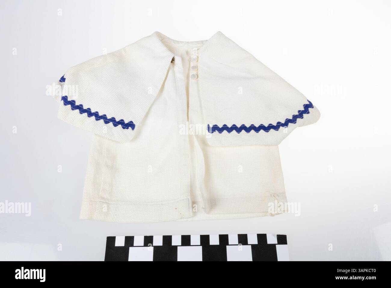 This composite doll features bangs and braided hair, with movable arms ...