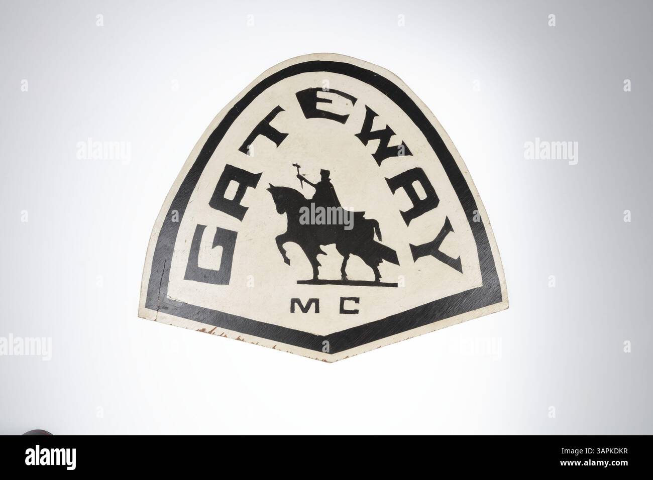This wooden crest from the Gateway Motorcycle Club marks the club’s ...