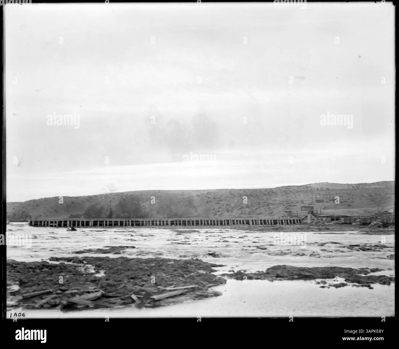A photograph showing an irrigation dam, flume, and spillways on the ...