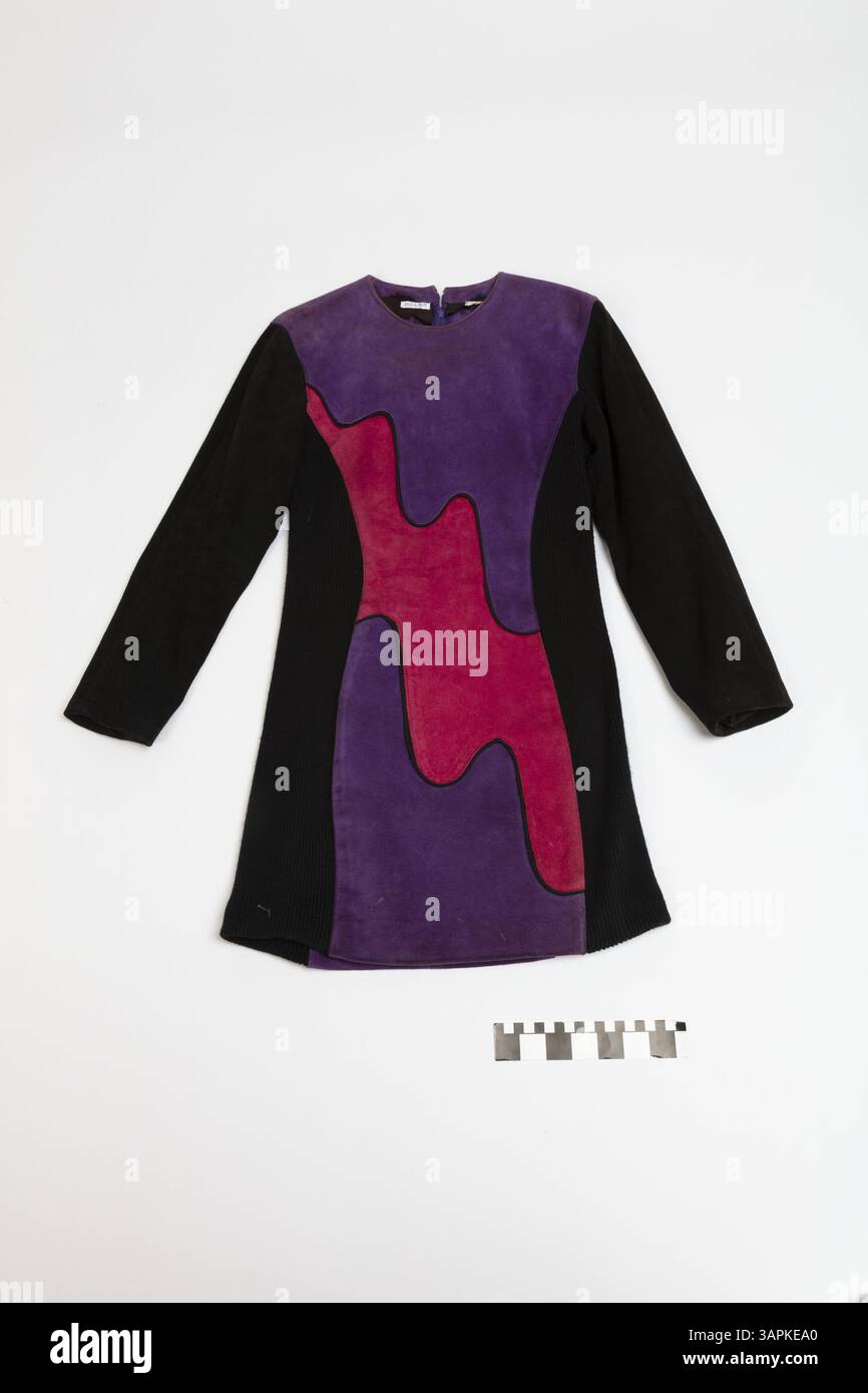 This tunic dress of black knit and suede, worn by Bonnie Blake ...