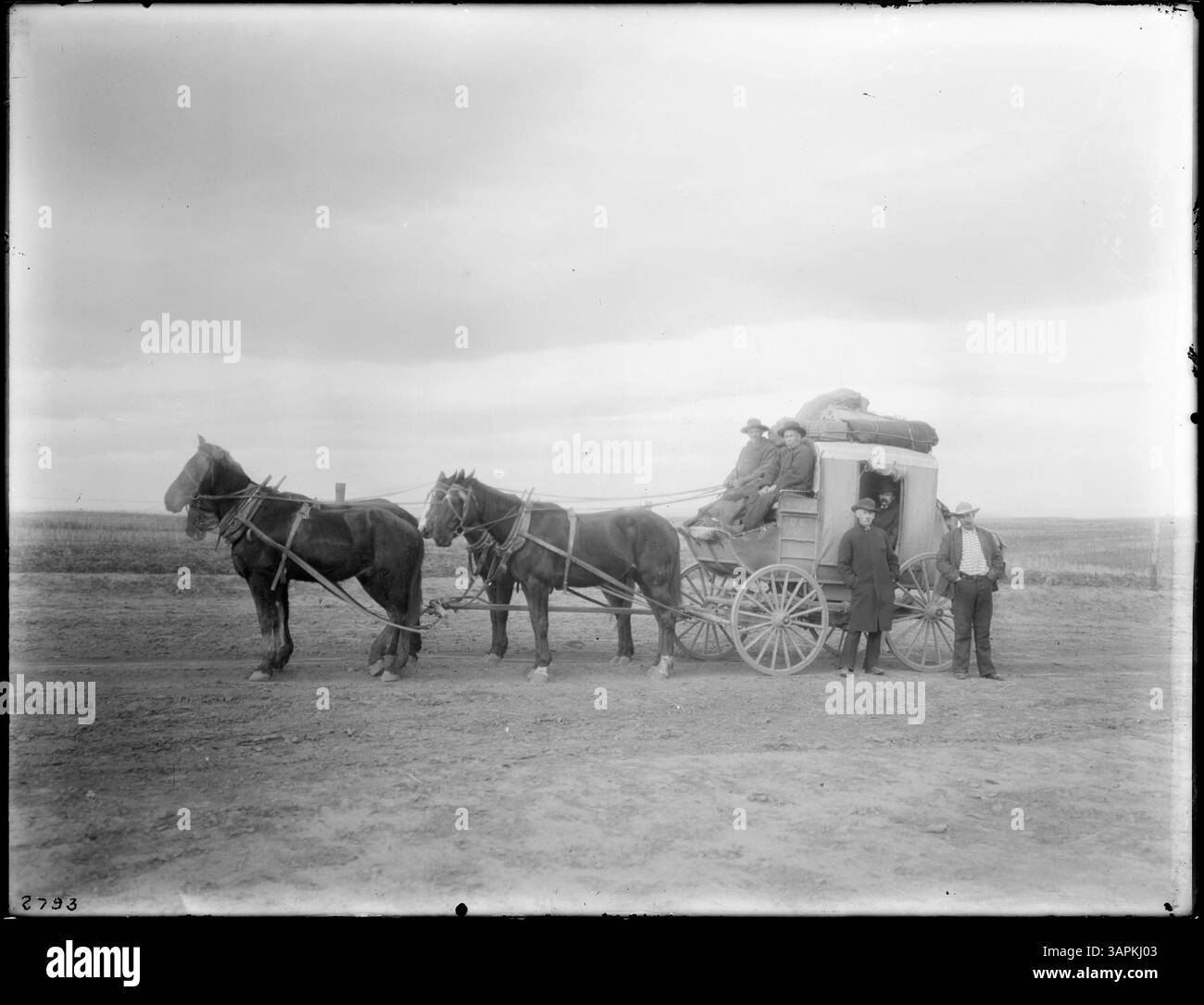 A four-horse stagecoach loaded with the 'US Mail' is featured in this ...