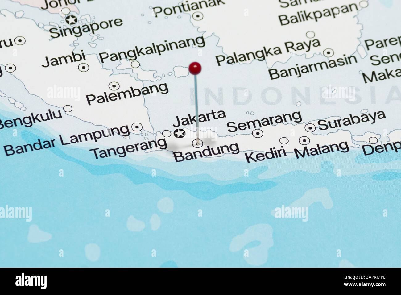 macro photo of a red pin needle into Bandung city of Indonesia ...