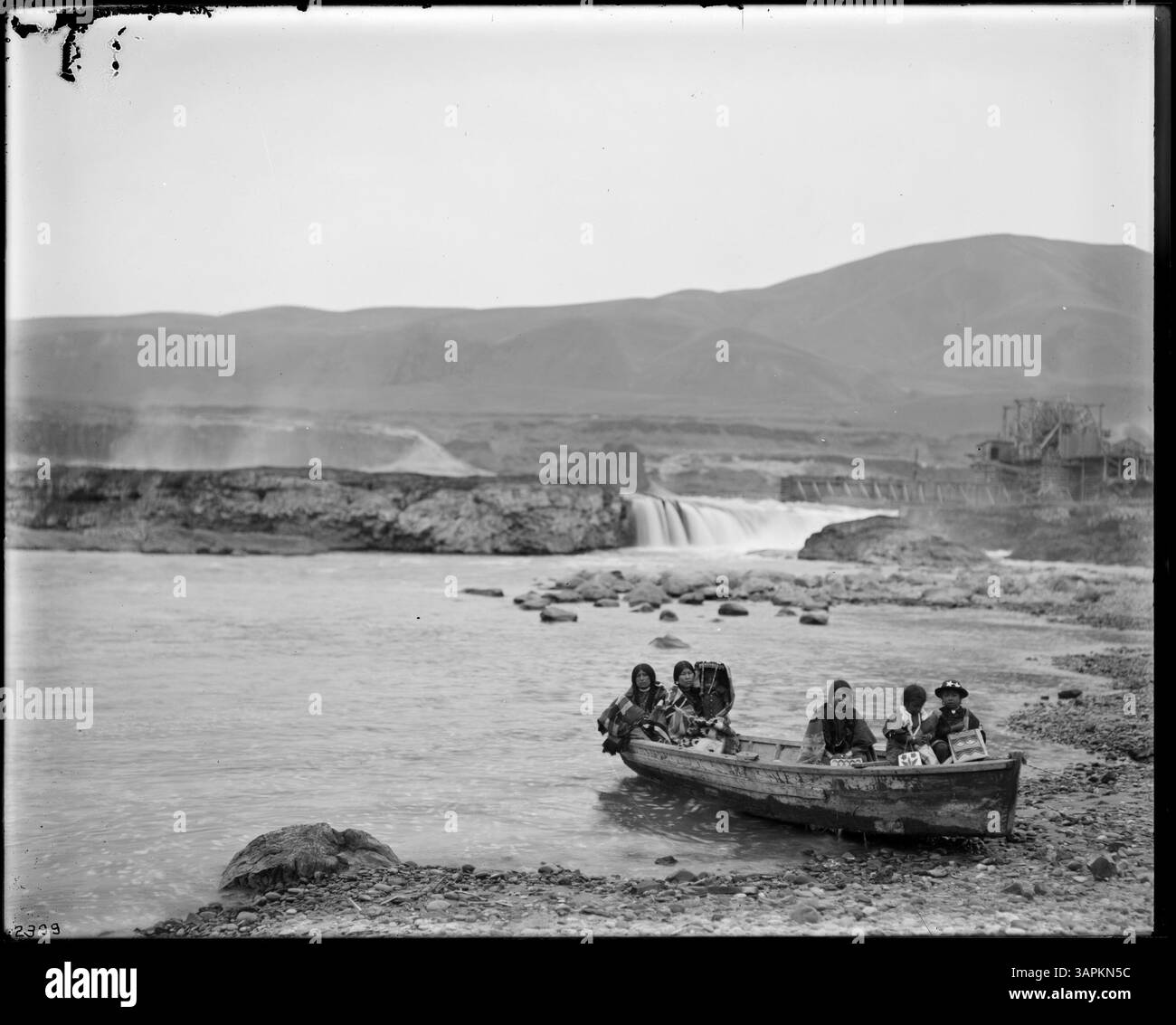 This photograph by Lee Moorhouse captures a tribal family fishing at ...