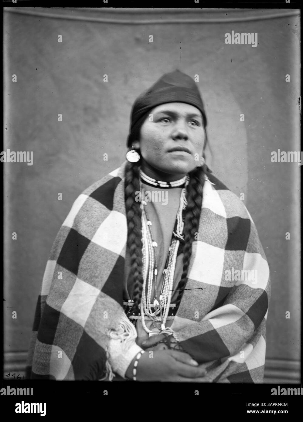 This photograph shows Wo-ho-pum, a Cayuse tribal woman, dressed in ...