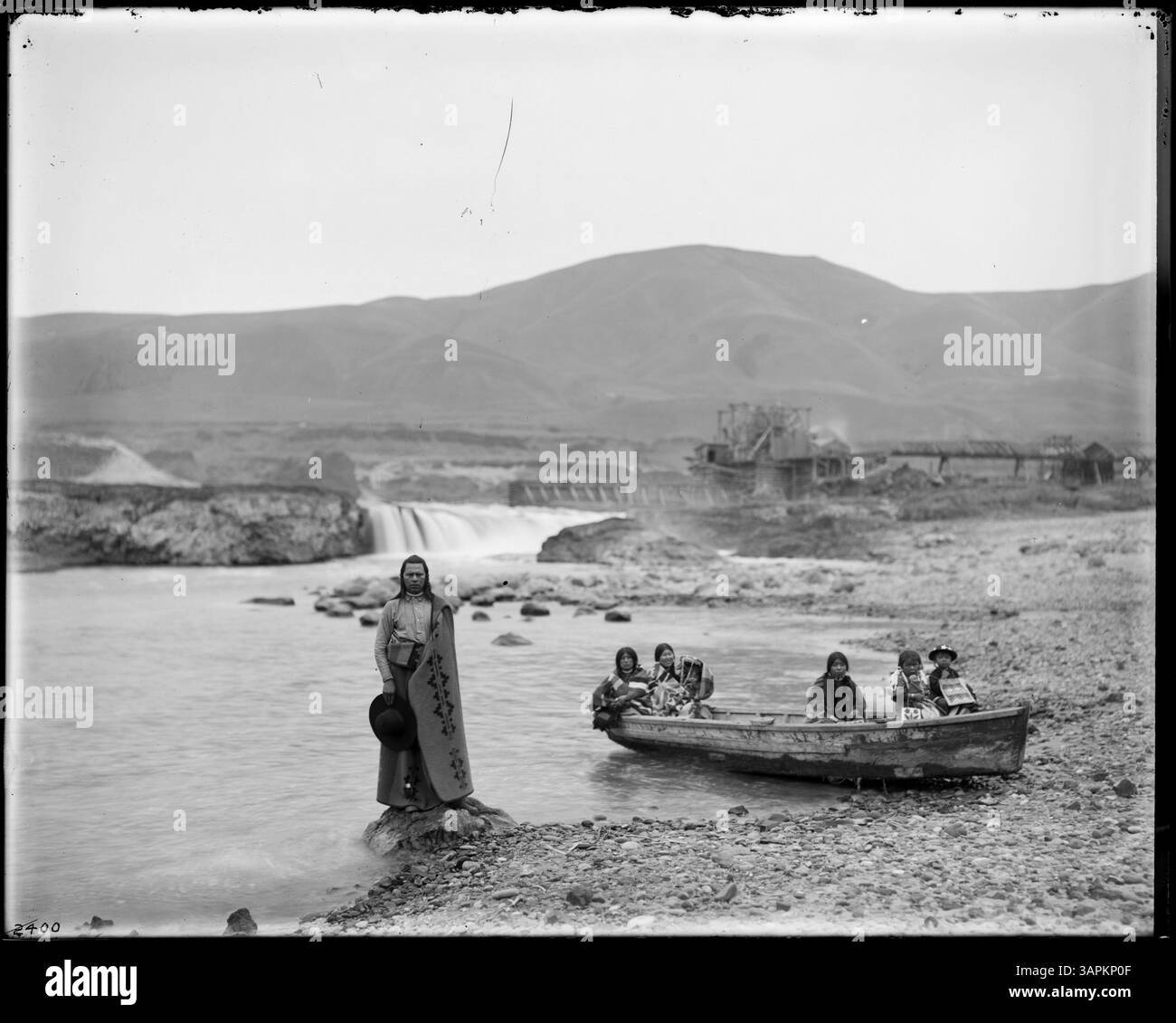 A photograph of a tribal family fishing at Celilo, showing tribal ...