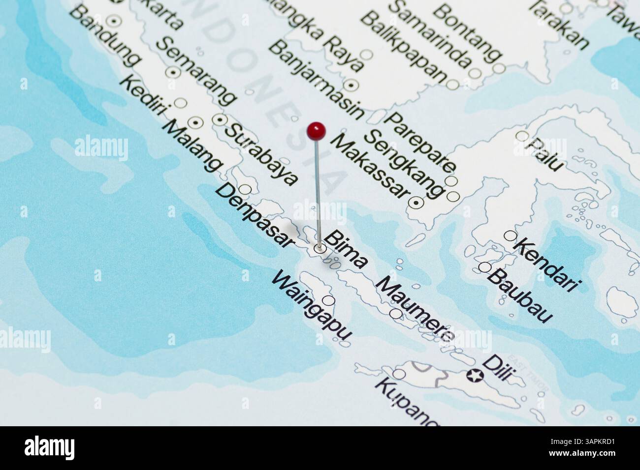 macro photo of a red pin needle into bima city of Indonesia political ...