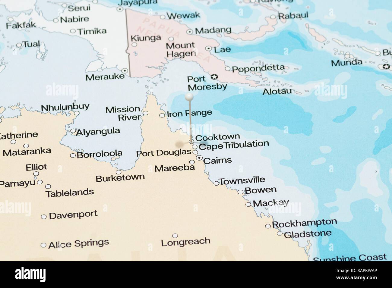 macro photo of a white pin needle into cooktown city of Australia ...