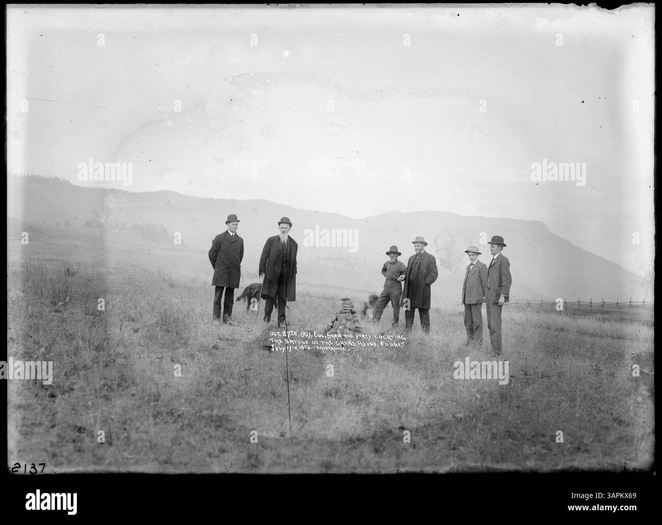 A photograph of Colonel B.F. Shaw and his party locating the site of ...