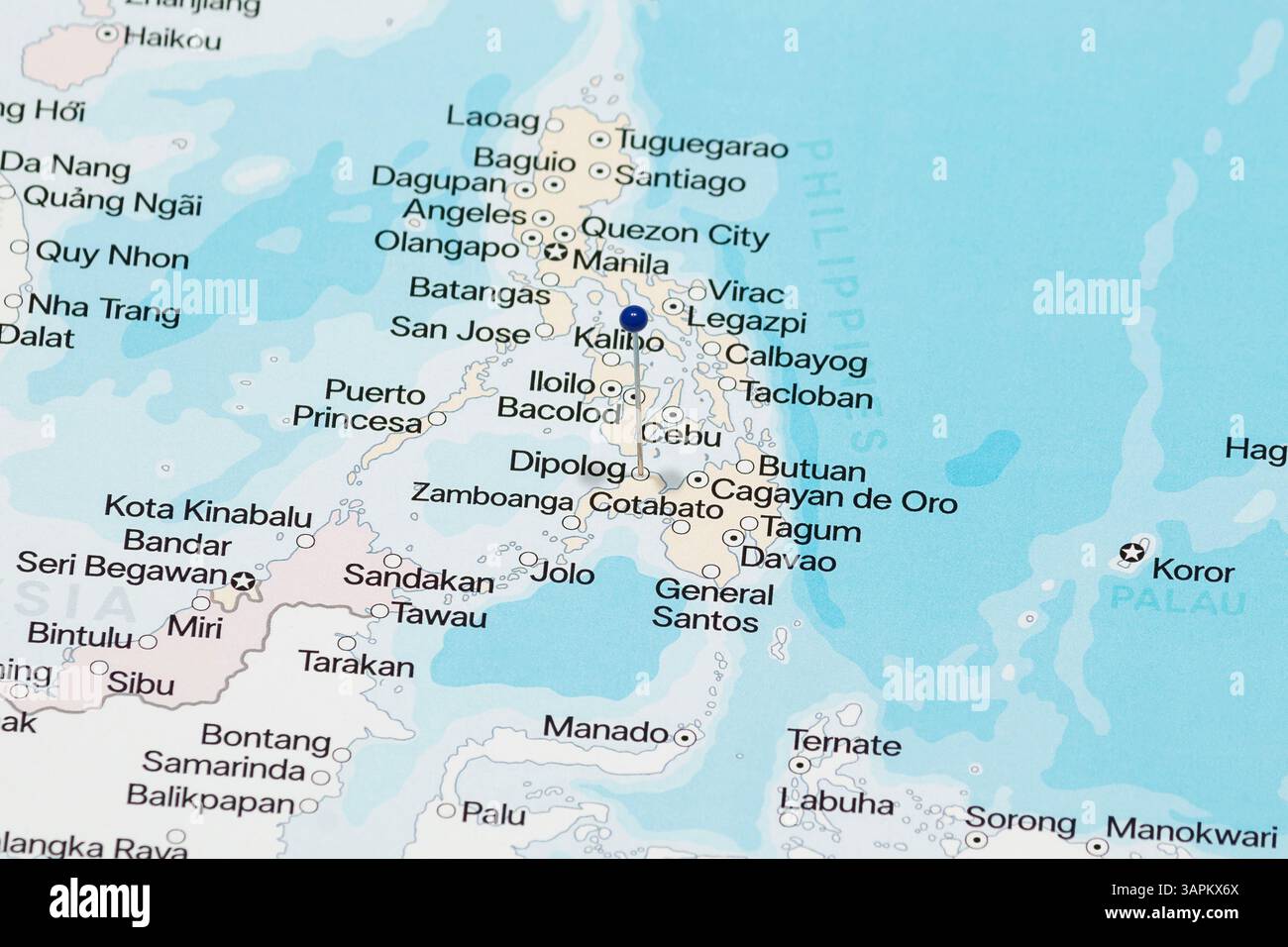 macro photo of a blue pin needle into dipolog city of Philippines ...