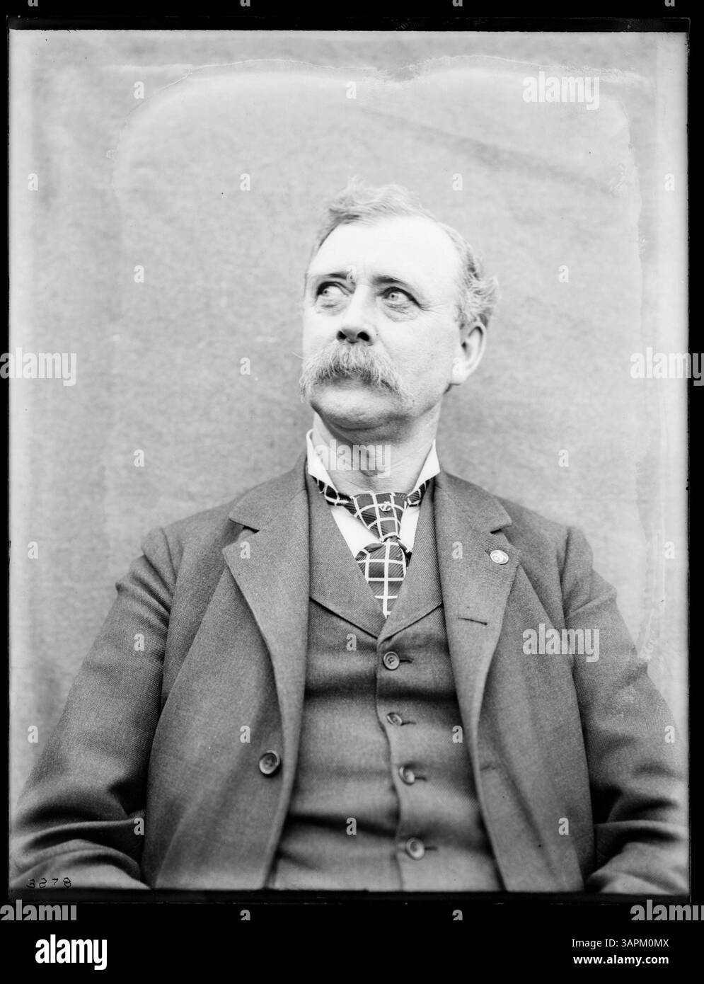 This photograph by Lee Moorhouse features portraits of men in dress ...