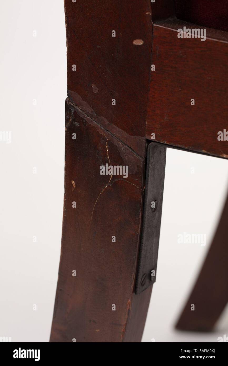 High-backed priest's chair with a red velvet upholstered seat and back ...